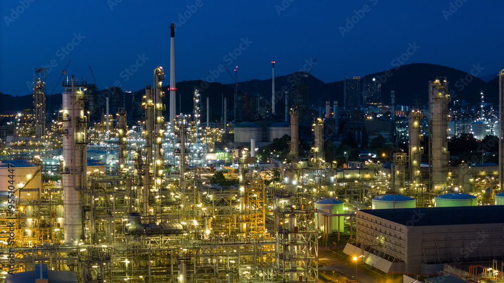 Oil Refinery plant at sunset. Gas Chemical Equipment Prodiction import ...