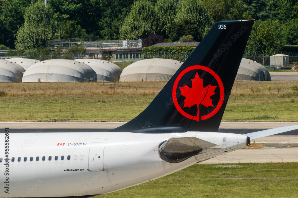 Geneva, Switzerland - August 13, 2024: sign and logo on the tailplane ...
