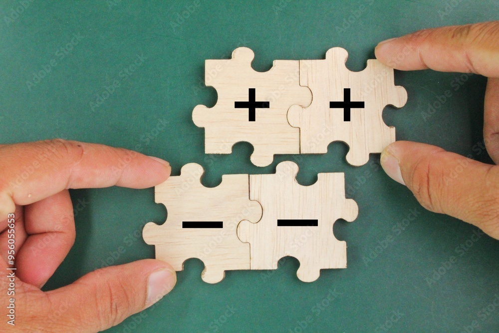 puzzle with two plus and minus symbols. mathematical concepts. positive ...