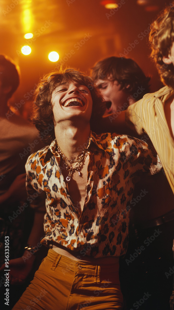 joyful moment at a 1970s-style disco party. A group of people are ...