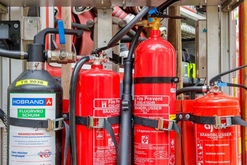 Dutch fire extinguishers on a fire brigade truck in Velp, The ...