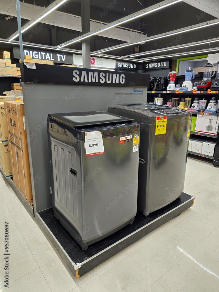 Samsung washing machines on display in an electronics store, showcasing ...