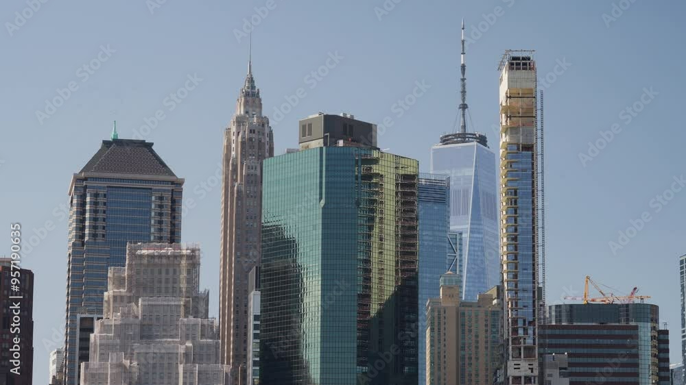 A crisp, clear view of the Lower Manhattan skyline, featuring iconic ...