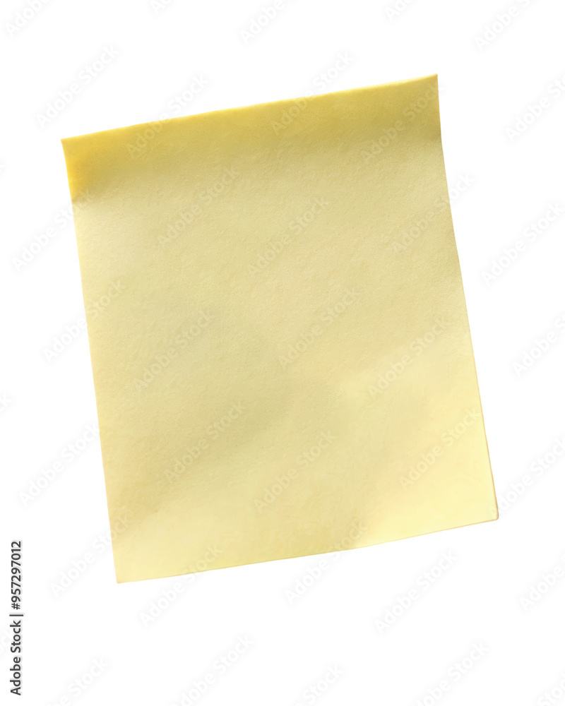 Yellow sticky note with a slight tilt, providing a blank surface for ...