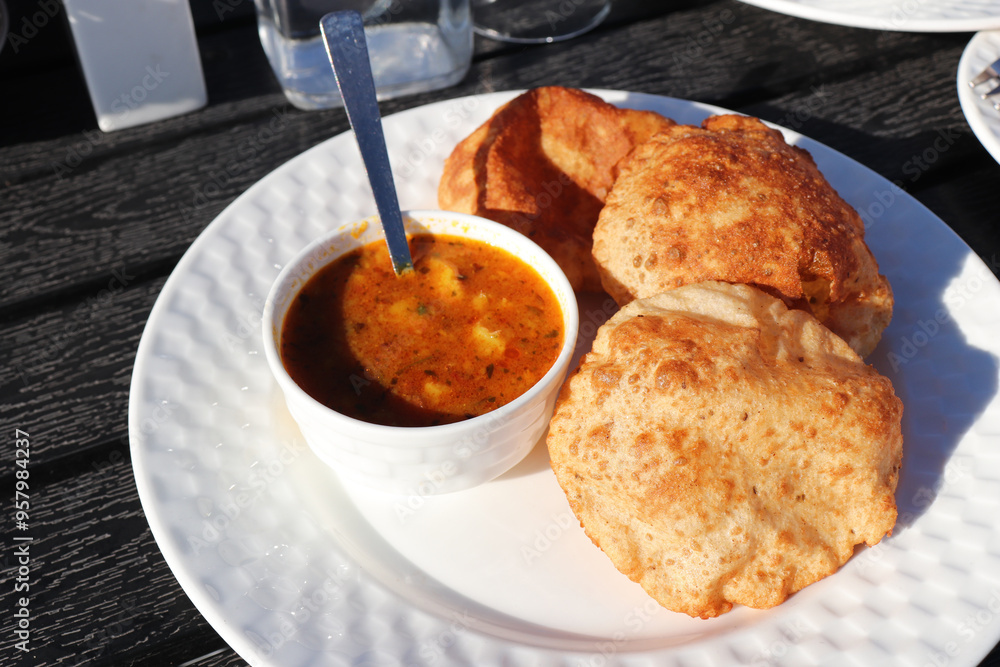 Indian cuisine - Puri Bhaji. It is a traditional breakfast dish in ...