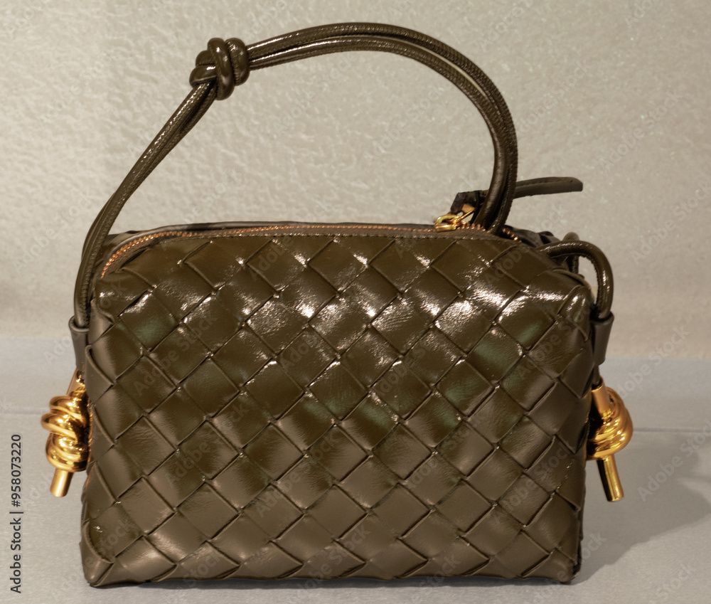 Brown patent leather woven Loop bag with golden metal knots by Bottega Veneta.Milan - Italy,25 ...