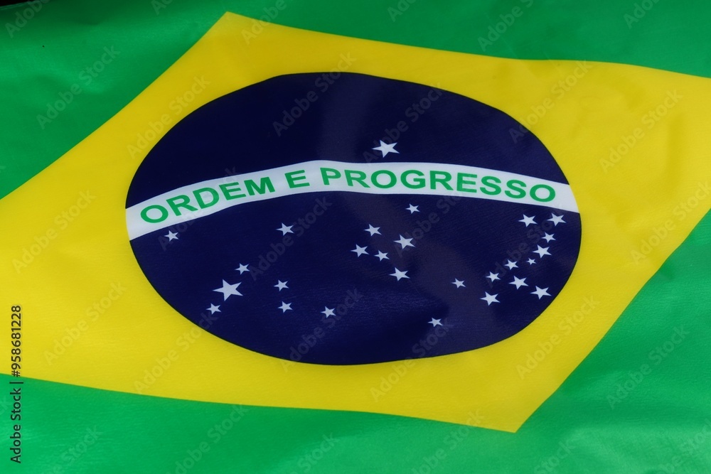 Colorful Brazilian flag displaying the motto Ordem e Progresso with ...