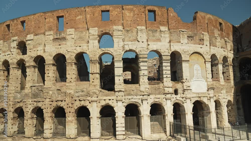 Crowd of tourists strolls near the Roman Coliseum or Flavian ...