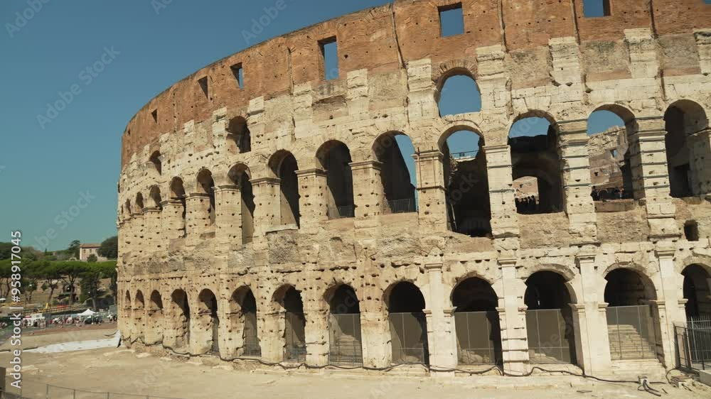 Crowd of tourists strolls near the Roman Coliseum or Flavian ...