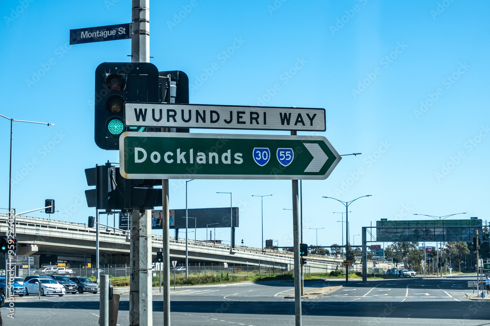 A road sign at an intersection in Melbourne, Australia, indicates the ...