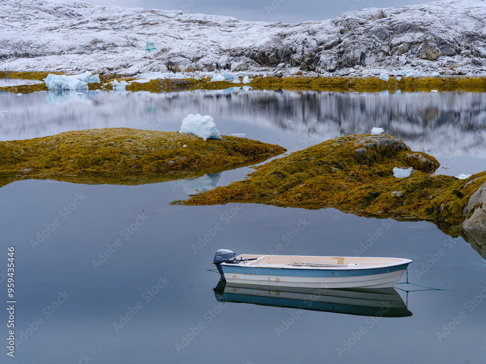 Little Inuit village Tinit (Tiilerilaaq) at the shore of the Sermilik ...