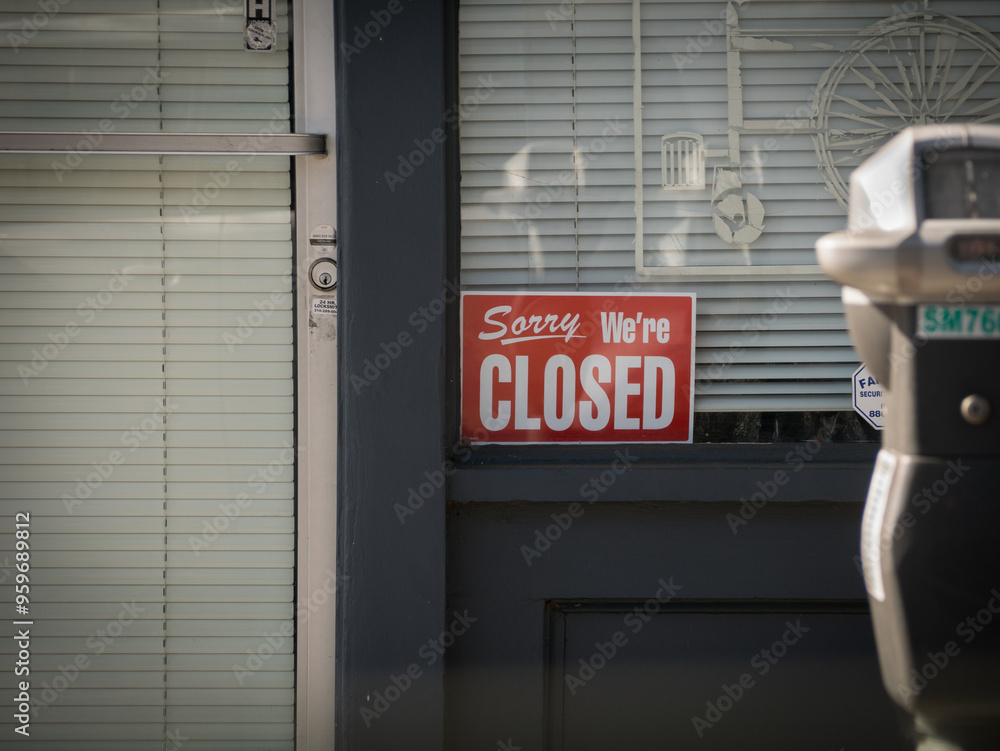 LOS ANGELES, CA - July 31, 2024: "Sorry We're Closed" sign posted in ...