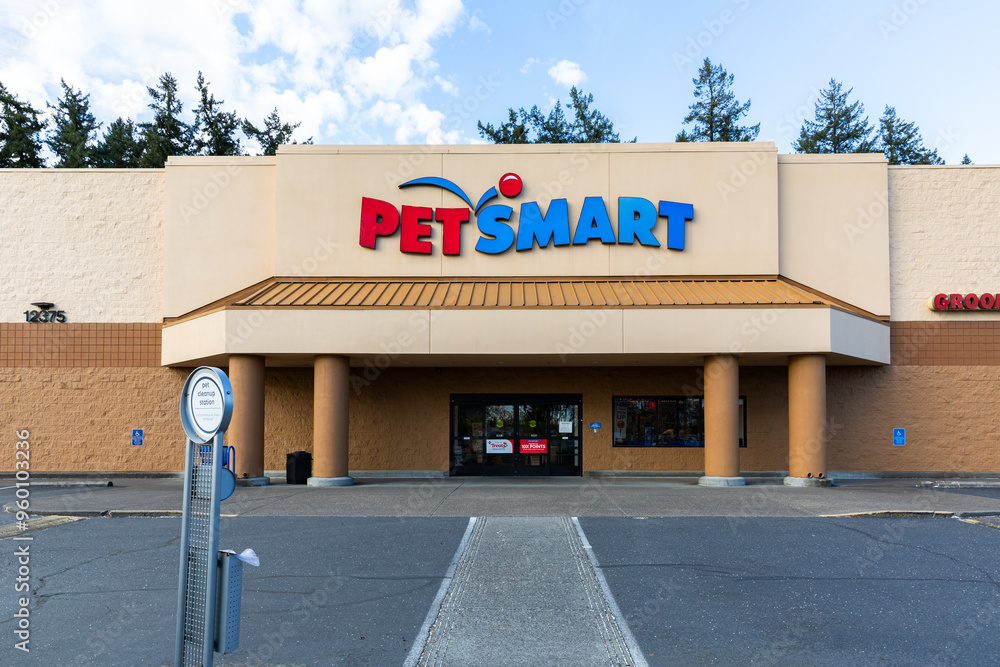 Beaverton, OR, USA - April 2, 2024 - Famous pets store chain Petsmart signage on on its store ...