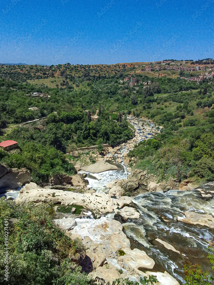 A stunning view of waterfalls and from under the suspension bridges of ...