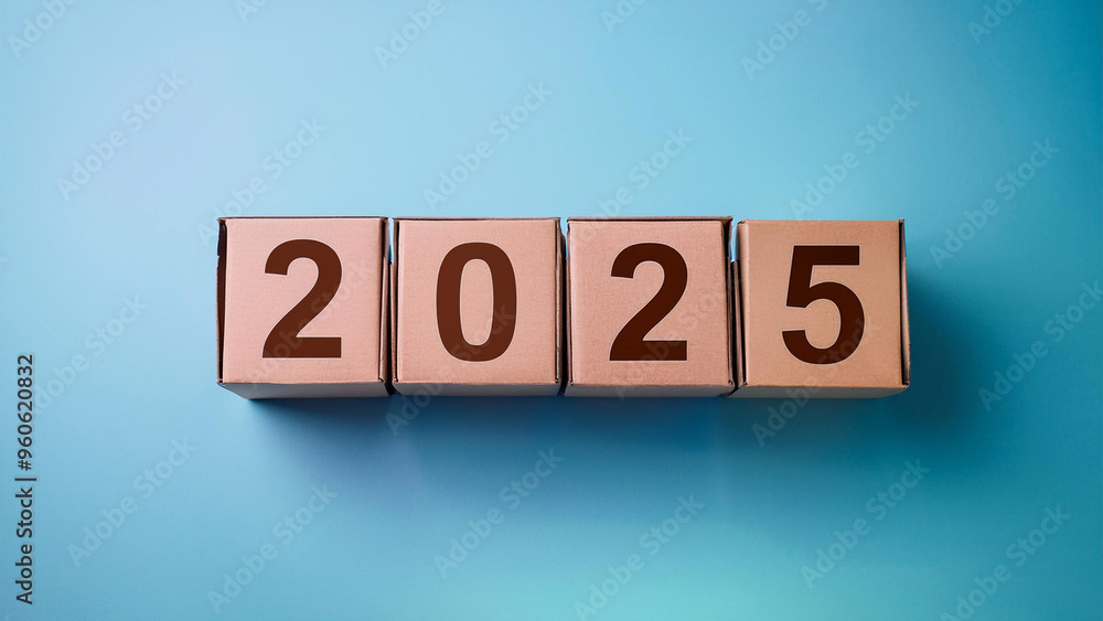 Número, ano 2025 escritos em caixas de papelão ordenadas em linha fundo ...