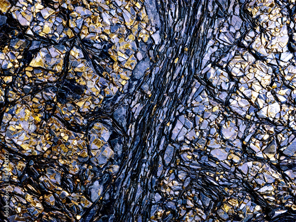 Schist A silvery schist stone with shiny mica inclusions floating and ...