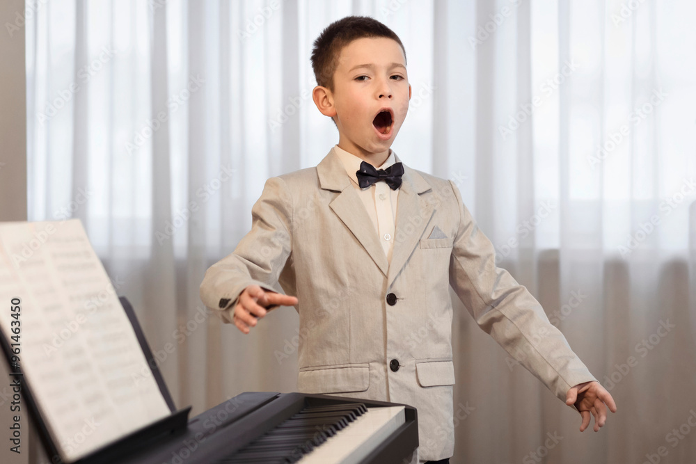 Singing Boy Child Prodigy Sings and Conducts with Hands at the Piano in ...