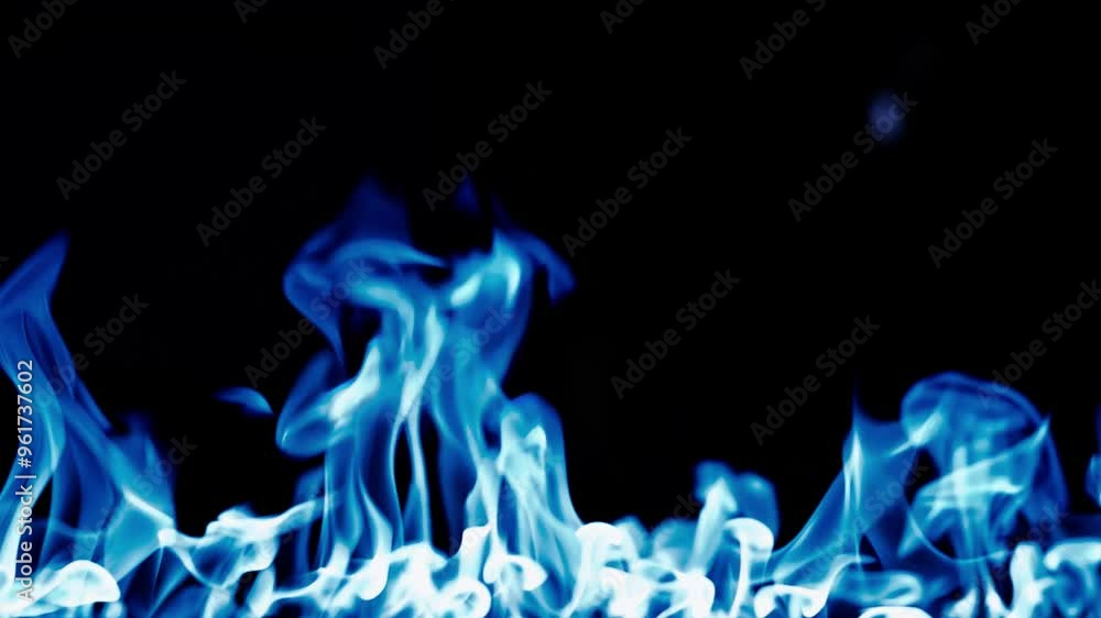 Gas burns with a bright blue flame. Blue fire is burning. Slow-motion ...