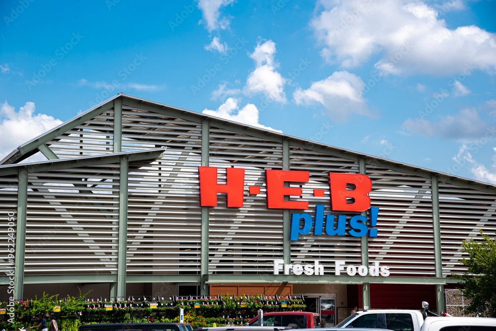 3D raised letter LED signage billboard at facade entrance of H.E.B Plus ...