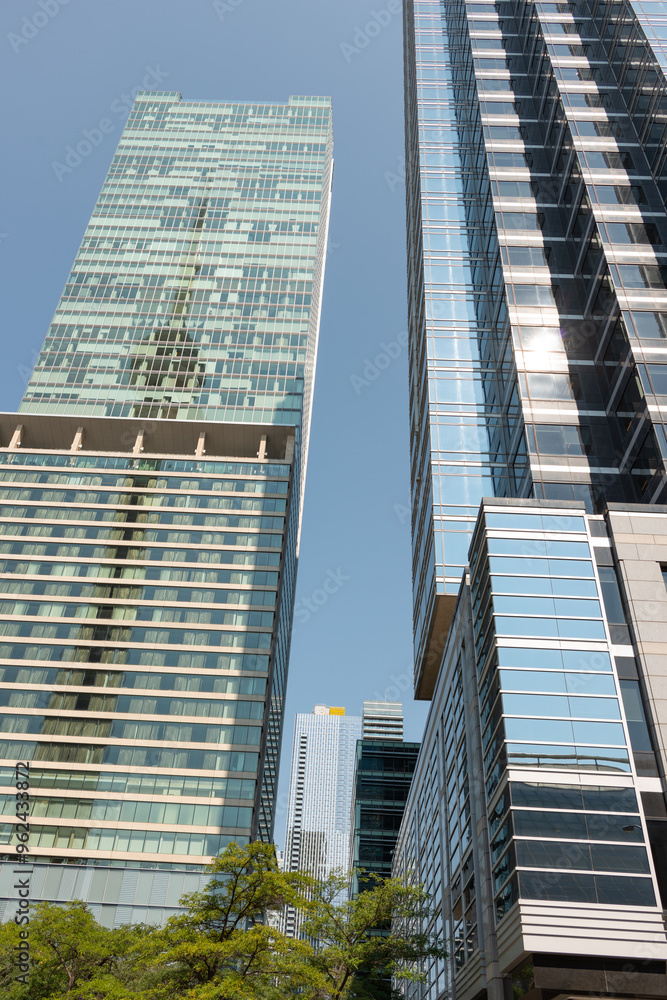 (left) south facing facade of The Ritz-Carlton and (right) south facing ...