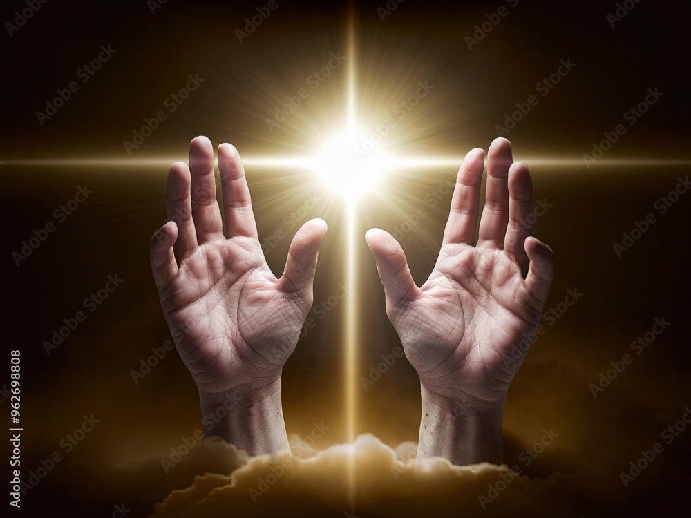 Hands of Jesus resurrected from the tomb with bright light ...