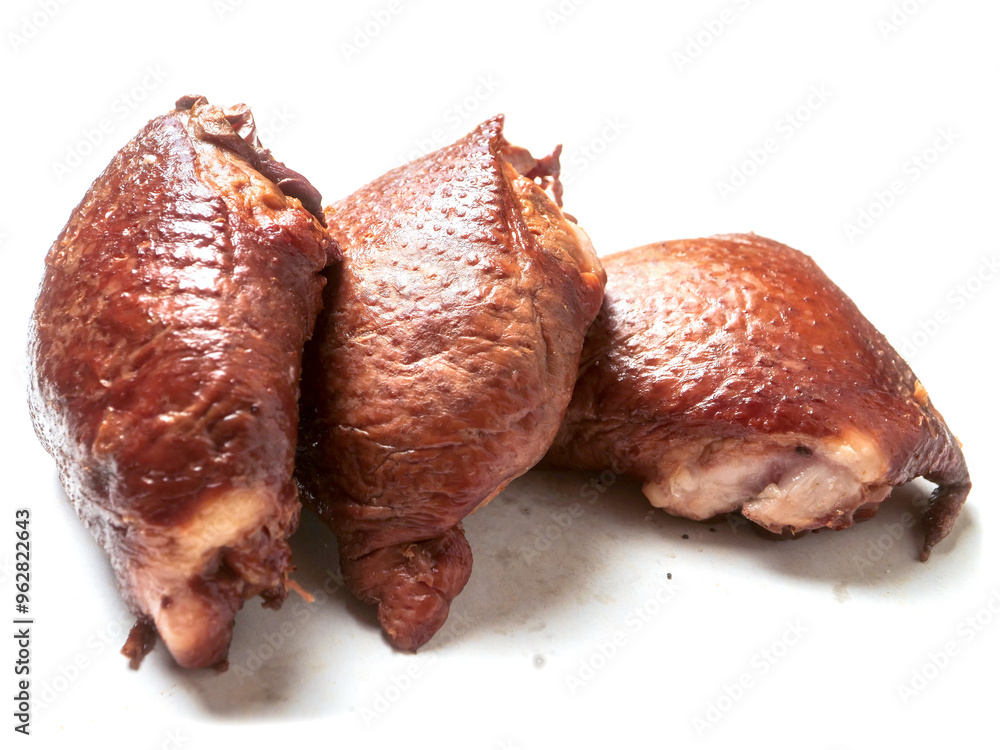 Smoked chicken thigh on the bone on white background. High quality ...