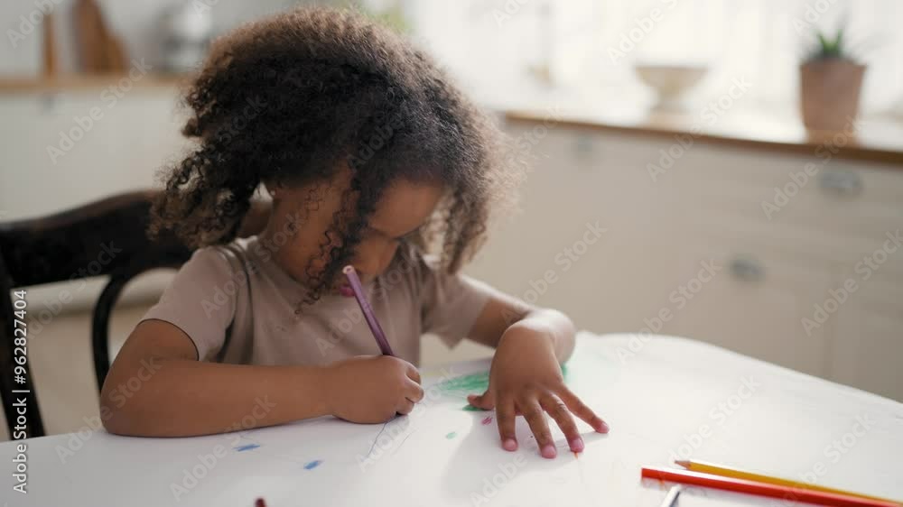 Lessons for preschoolers, little black girl drawing by crayons, happy ...