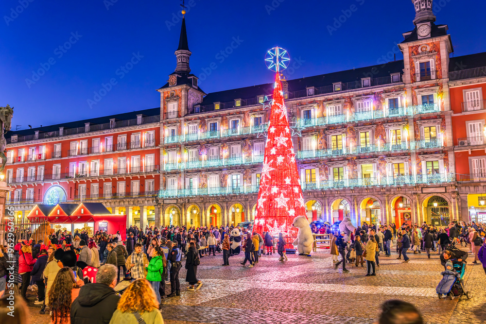 Madrid, Spain - December 18, 2023. Festive crowd gathers in Plaza Mayor ...