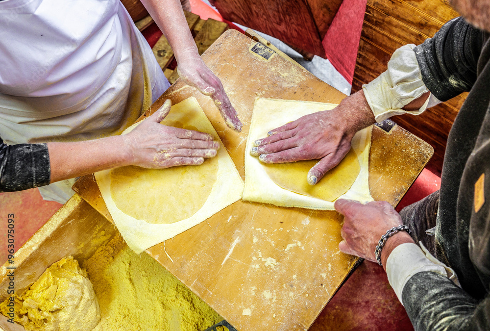 Basque farmers (Baserritarras) making Talos, a Basque tortilla stuffed ...