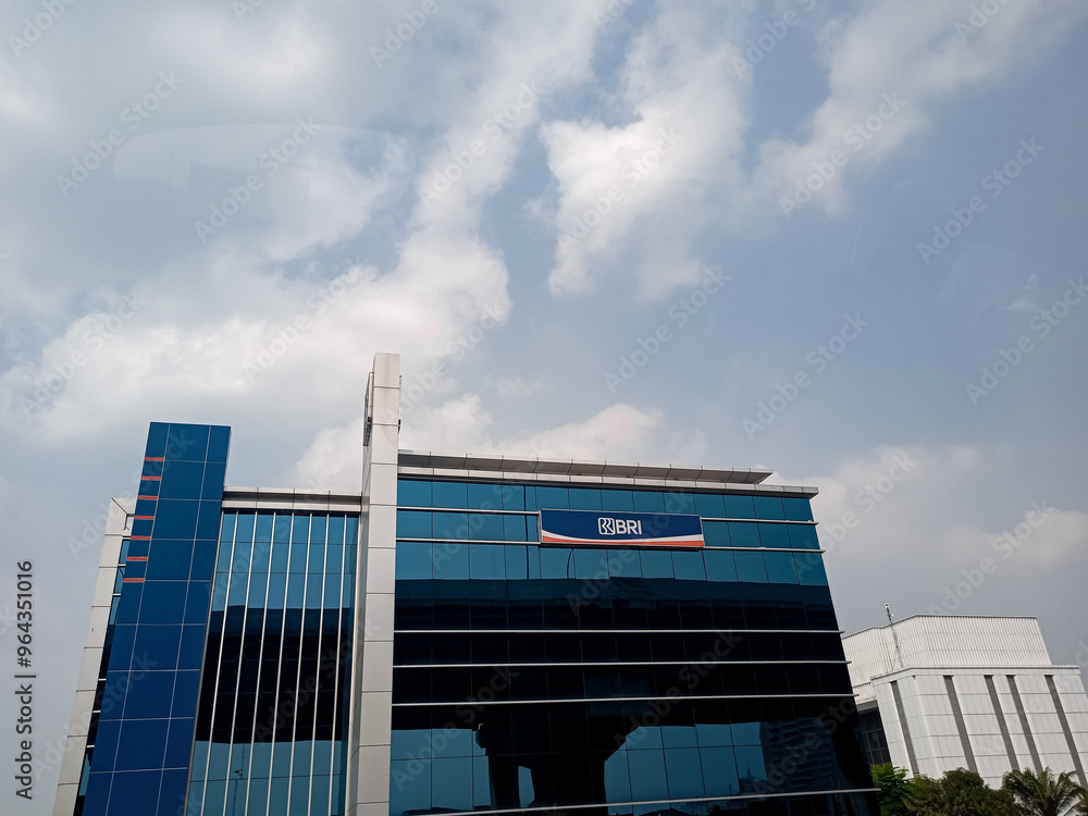 The building of Bank BRI (Bank Rakyat Indonesia) against the blue sky ...