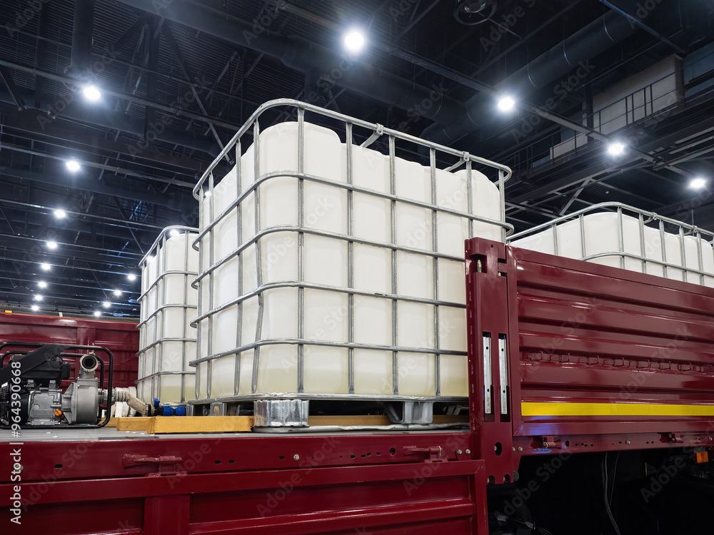 IBC tanks in back of truck. IBC tanks inside industrial building ...