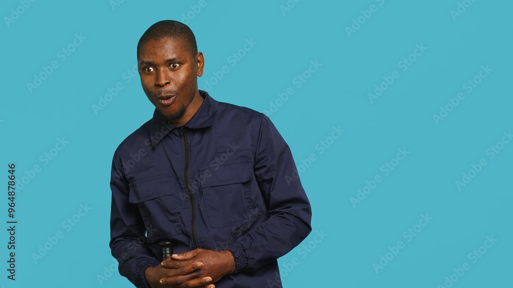 Security guard pointing finger, scolding people for trespassing on ...