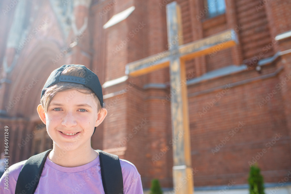 portrait of a 12 year old happy boy in front of a Catholic church Stock ...