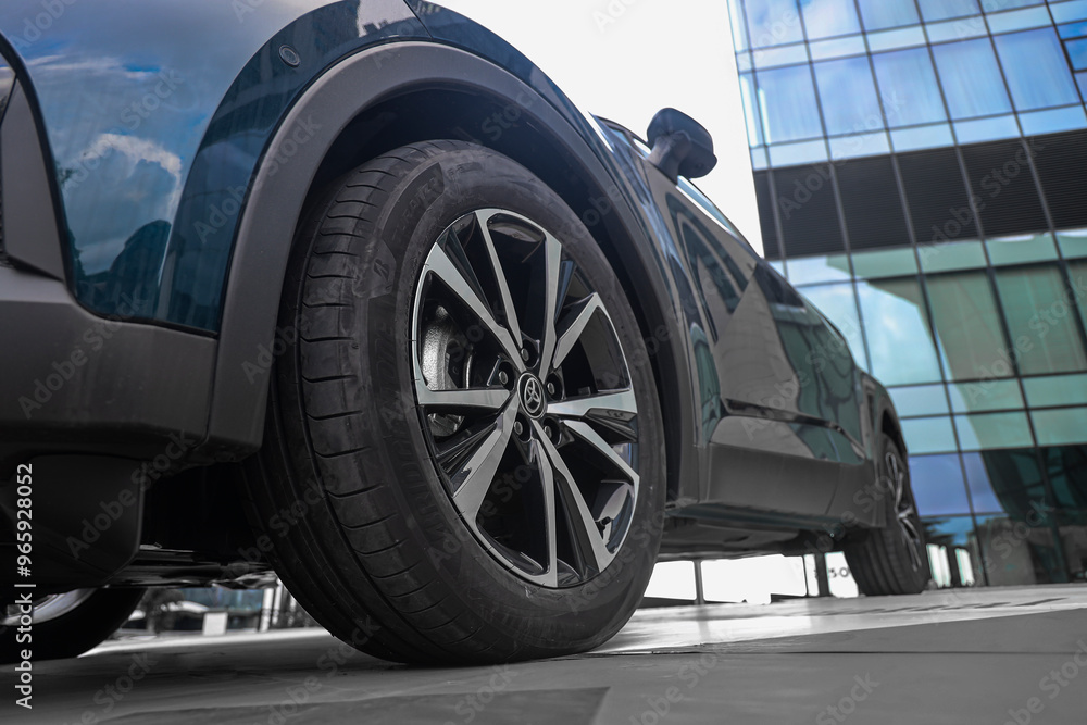 BATUMI, GEORGIA - MARCH 12, 2024: Car showroom. Aluminum wheel with ...