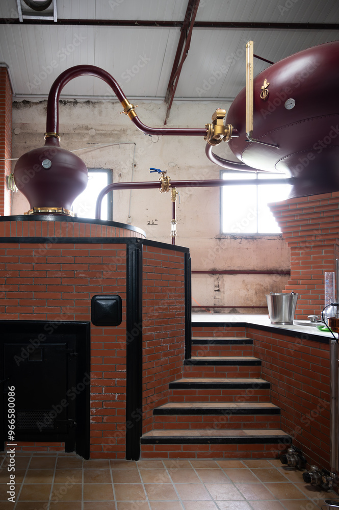 Double distillation process of cognac spirit in Charentias copper ...