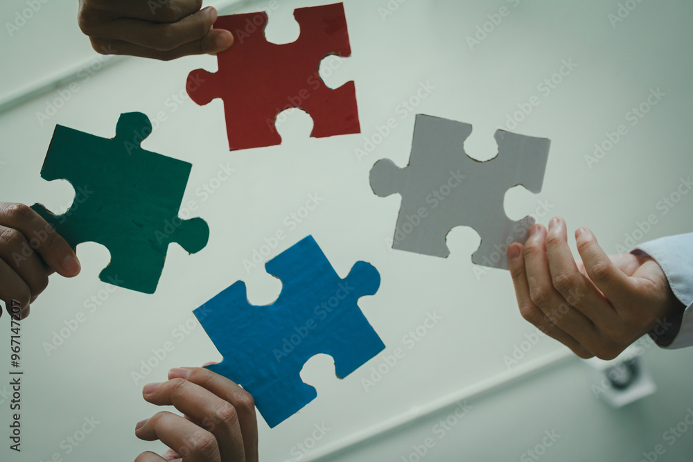 successful business team collaborates to solve challenges, symbolized ...