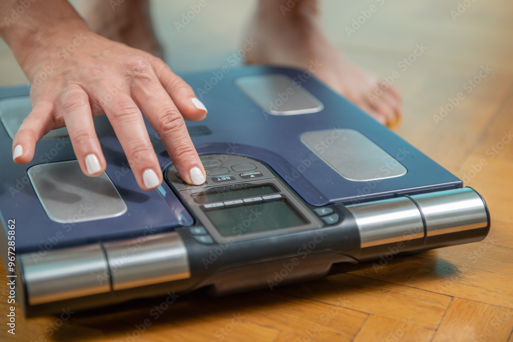 Body fat scale for measuring body composition. Stock Photo | Adobe Stock