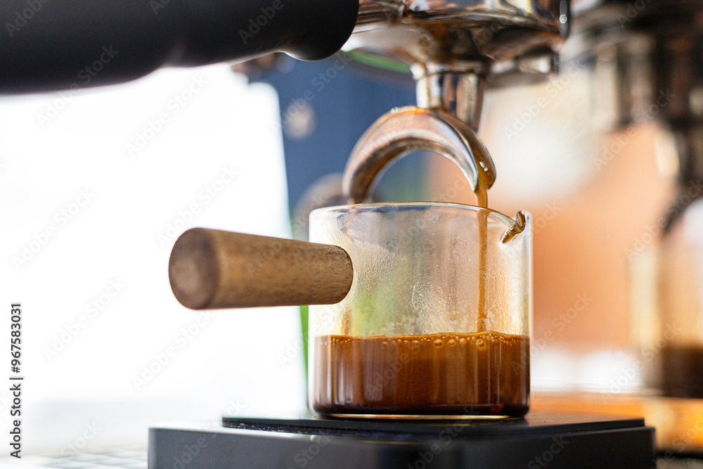 Espresso coffee extraction from coffee machine with a bottomless filter ...