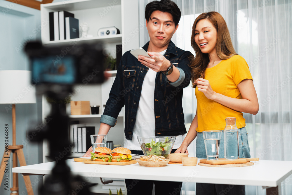 Chef influencers reading comment on phone for answer time on social ...