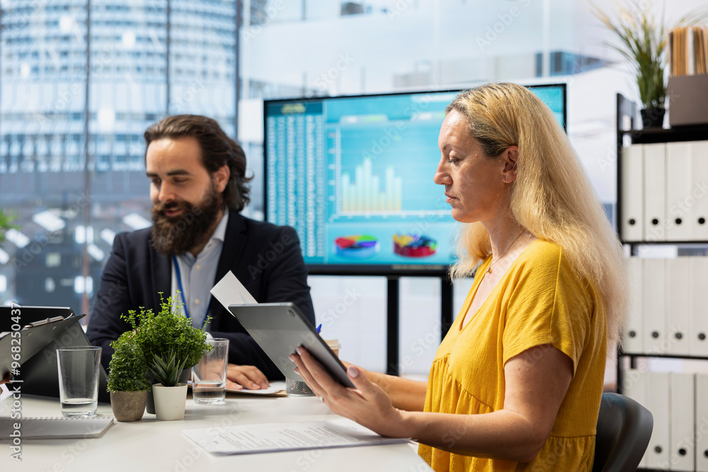 Financial advisor helping clients build and manage diversified ...