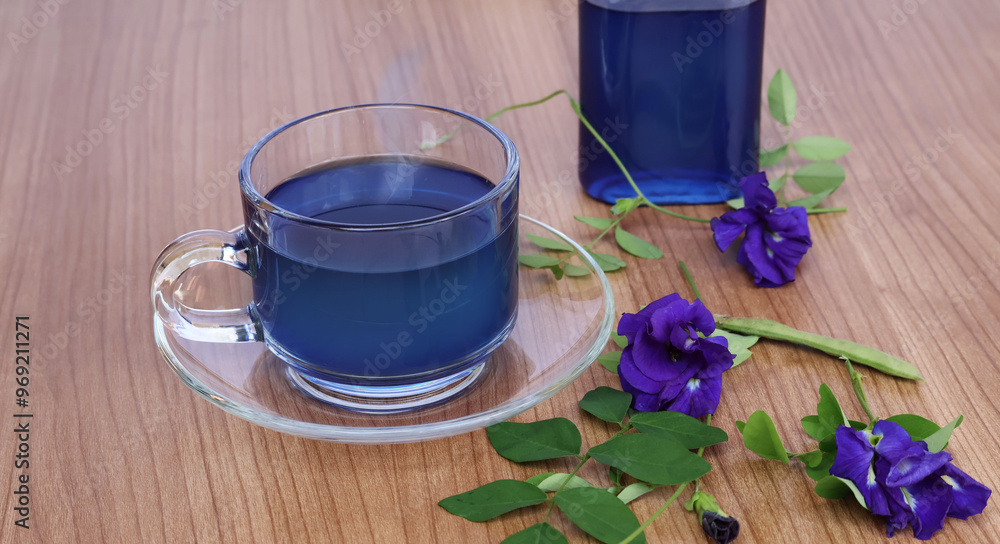 Hot blue butterfly pea flower tea in a cup and saucer. Place the ...