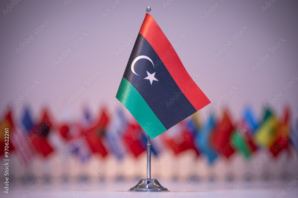 The Libyan Flag is prominently displayed alongside various ...