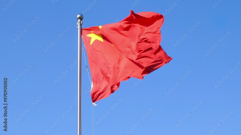 The Chinese national flag, known as the Five-star Red Flag, waving ...