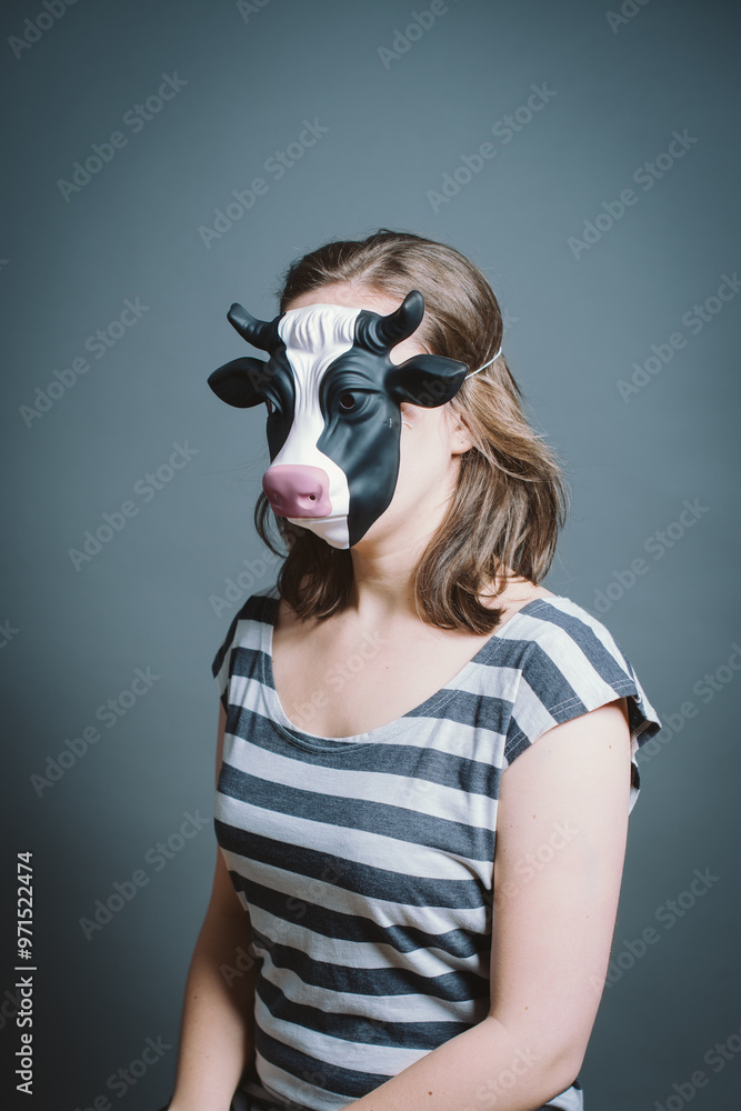 Studio, person and thinking with cow mask for character, facade and ...