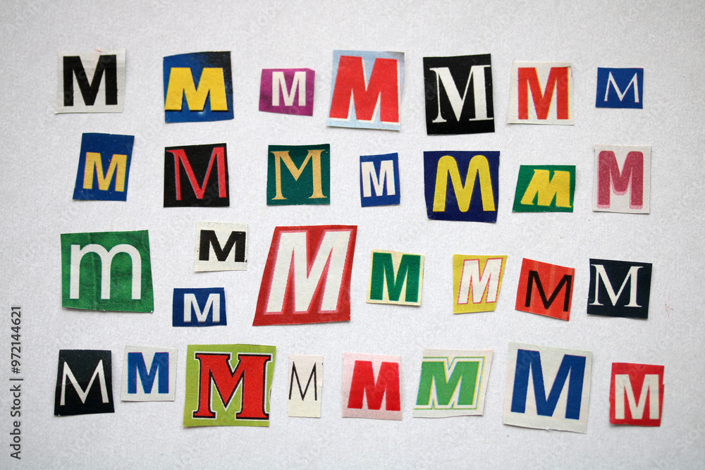 letter M. is a collection of letters cut from magazines and newspapers ...