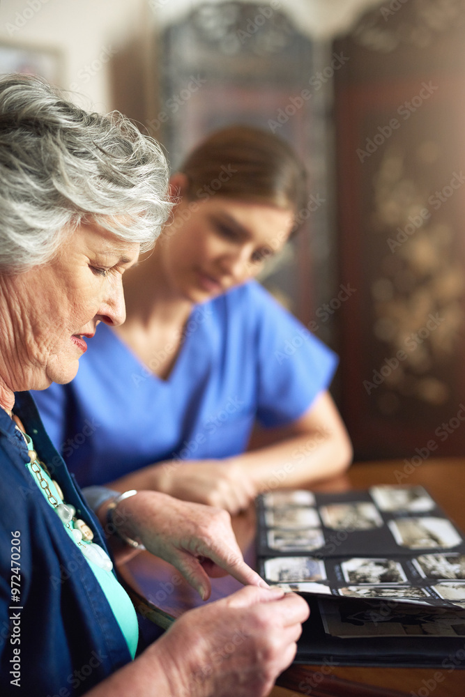 Nurse, senior woman and photo album in retirement, sad and pictures for ...