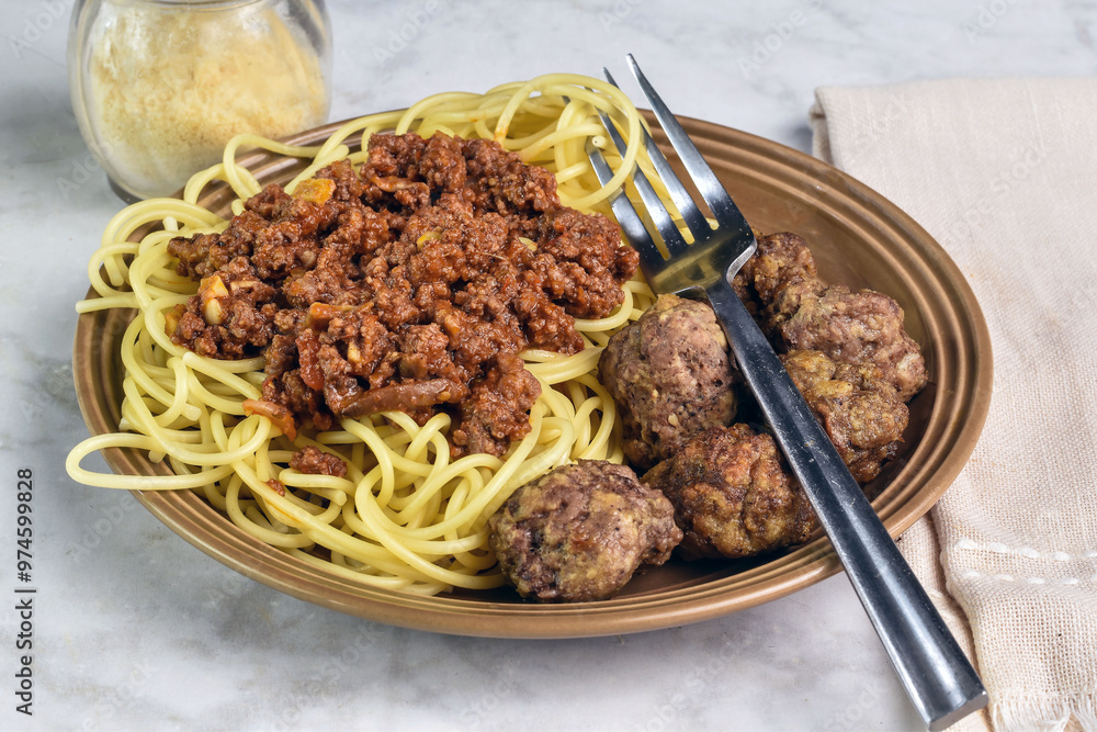 spaghetti and meat sauce with a side of meat balls Stock Photo | Adobe ...