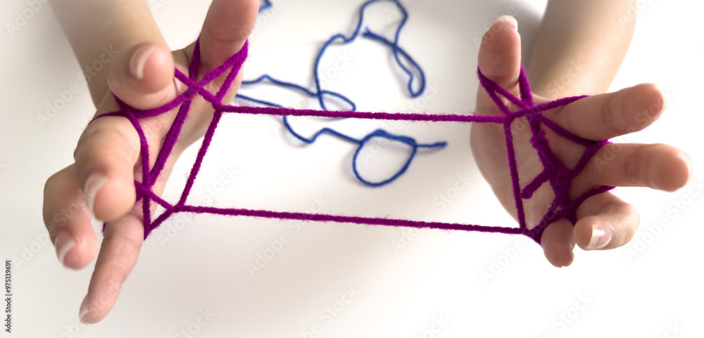 Traditional Japanese string game called AYATORI or cat's cradle ...