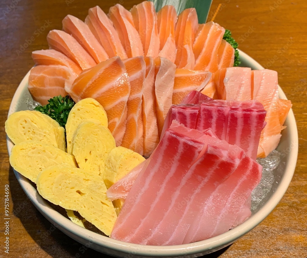 Sashimi set includes salmon, Tamagoyaki (sweet egg), and tuna from ...