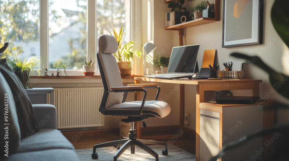 Ergonomic work-from-home setup with a comfortable office chair, laptop ...